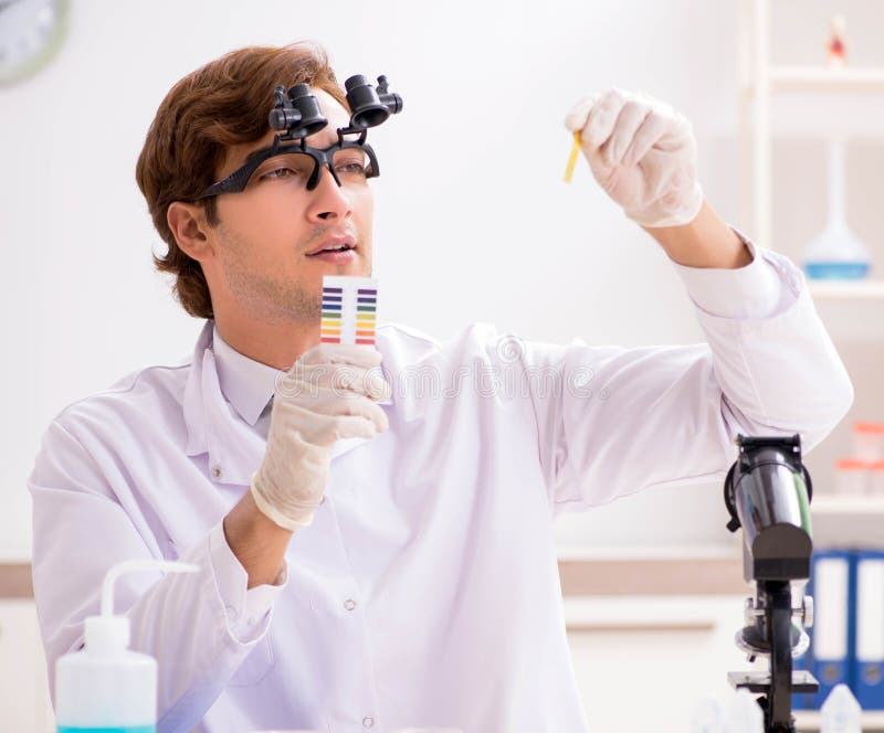 Chemist in the Lab Checking with Ph Strips Stock Photo - Image of glass ...