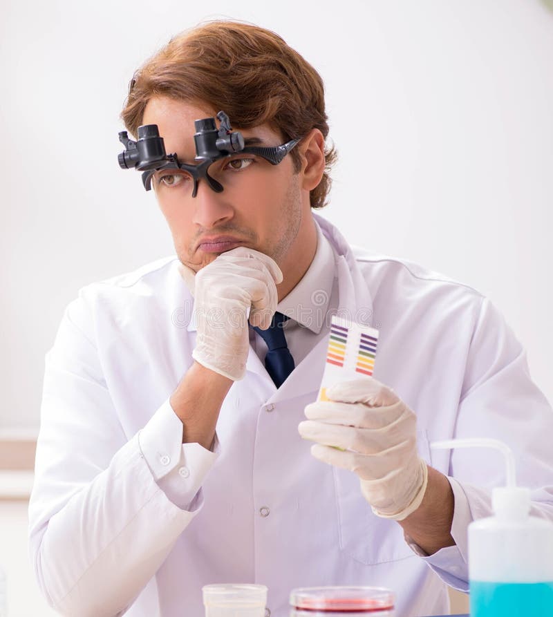 Chemist in the Lab Checking with Ph Strips Stock Image - Image of acid ...