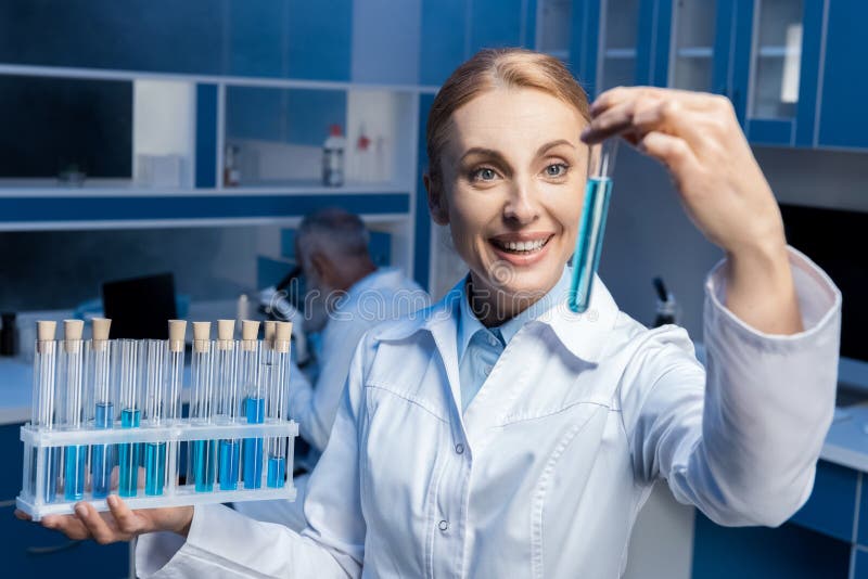 Chemist in Lab Coat Holding Tubes at Laboratory Stock Image - Image of ...