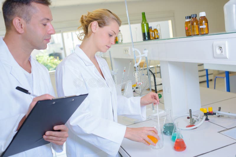 Chemist observing work stock image. Image of scientist - 268279955