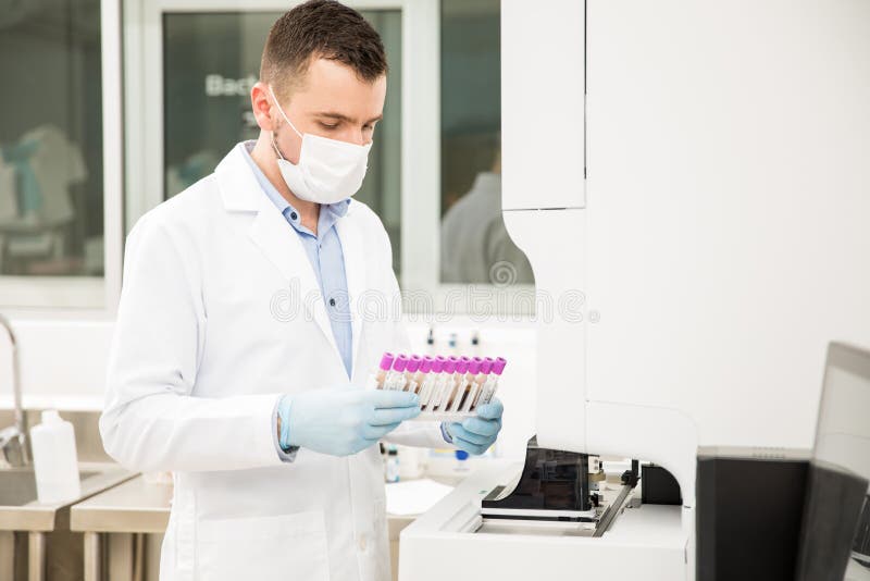 Chemist Running Blood Tests in a Lab Stock Image - Image of clinic ...