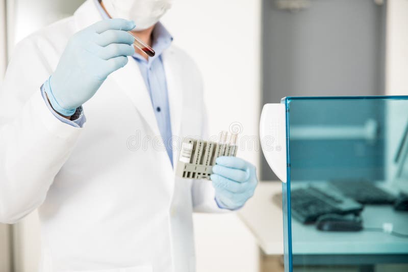 Chemist Running Blood Tests in a Lab Stock Image - Image of hispanic ...