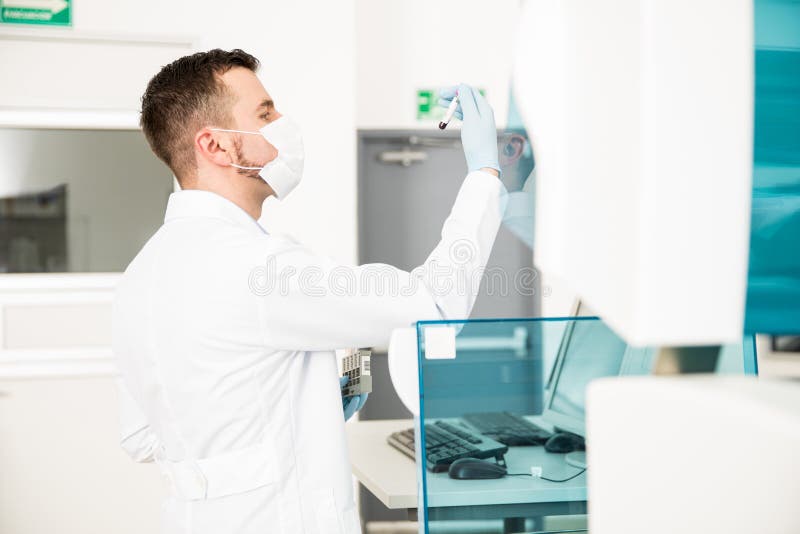 Chemist Running Blood Tests in a Lab Stock Photo - Image of label ...