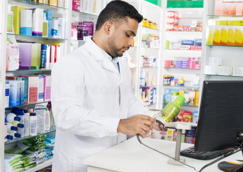 Chemist Scanning Barcode of Product at Counter Stock Image - Image of ...
