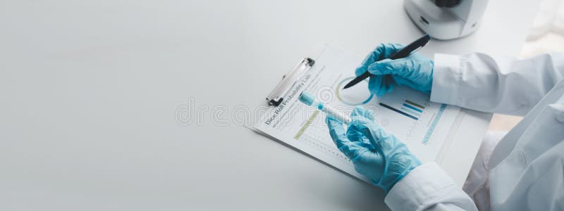 Chemist Taking Notes on Research Data, Scientist is Working in the ...