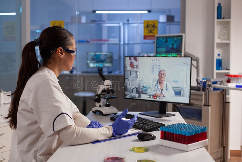 Chemist Using Video Call Technology on Computer Stock Image - Image of ...