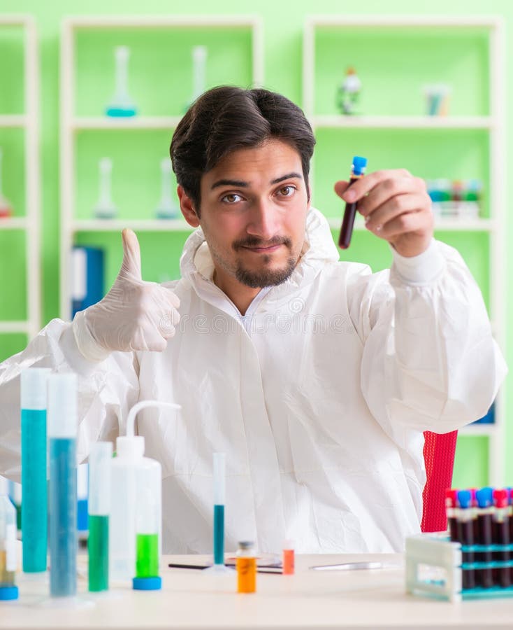 Chemist Working in the Lab on New Experiment Stock Photo - Image of ...