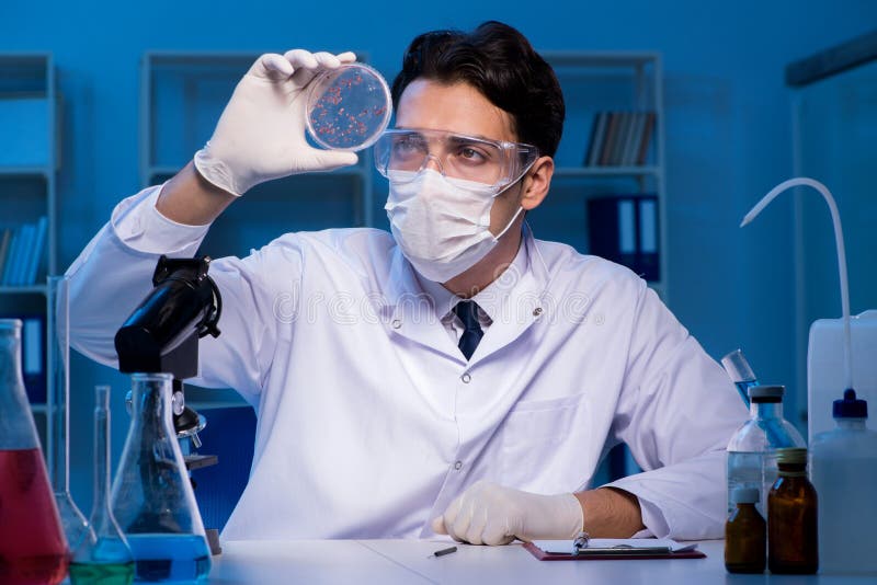 The Chemistry Assistant Working in the Chemical Lab Stock Image - Image ...