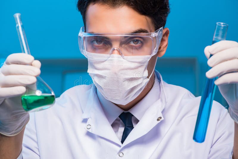 The Chemistry Assistant Working in the Chemical Lab Stock Image - Image ...