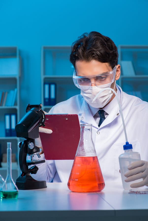 The Chemistry Assistant Working in the Chemical Lab Stock Photo - Image ...