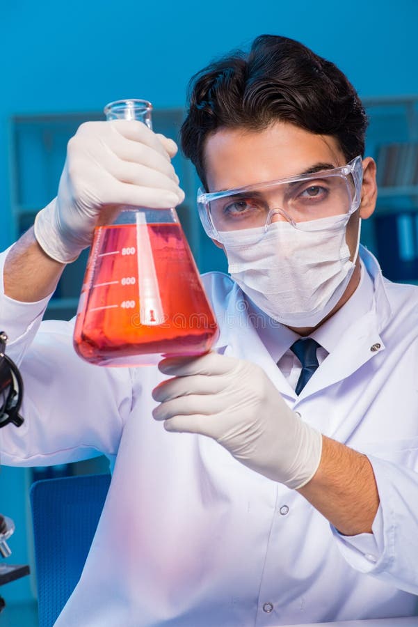 The Chemistry Assistant Working in the Chemical Lab Stock Photo - Image ...