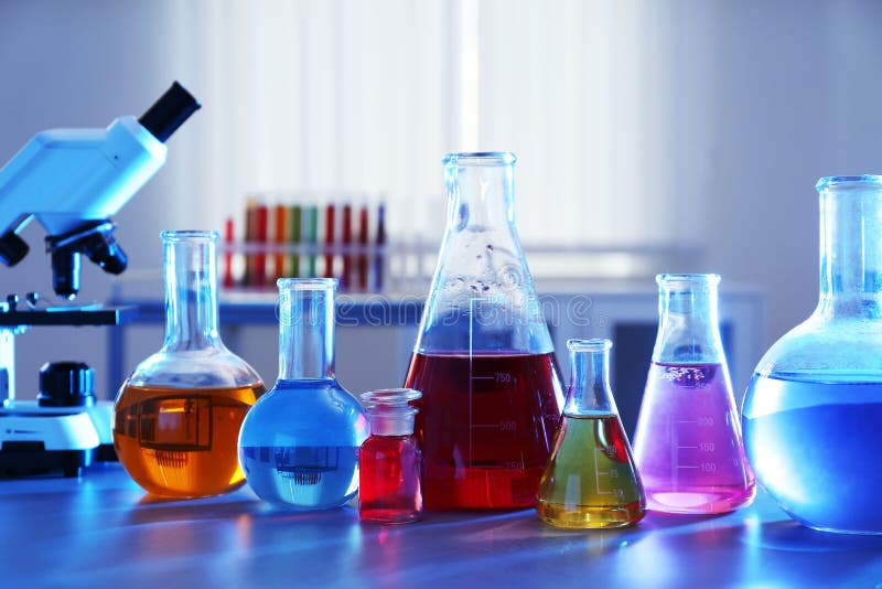 Chemistry Glassware with Liquids on Table Stock Image - Image of ...