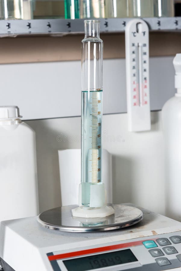 Chemistry and Medicine, Flask with Blue Liquid Stands on the Scales ...