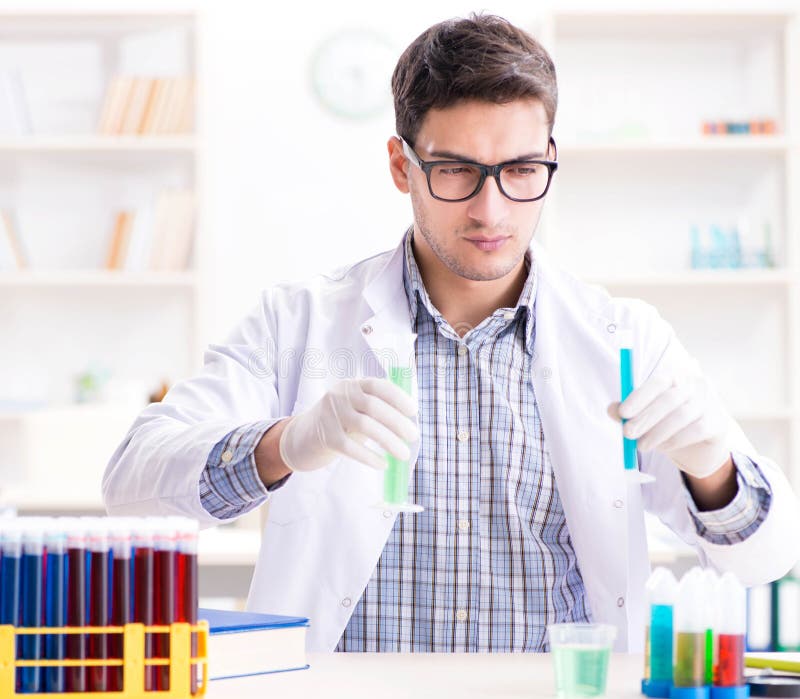 Chemistry Student Doing Chemical Experiments at Classroom Activi Stock ...