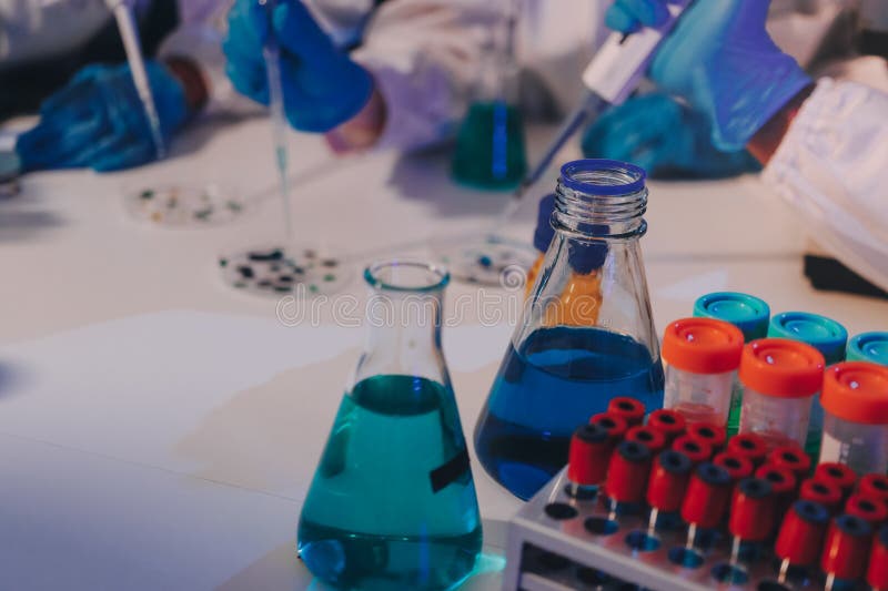 Chemists in a Lab Developing Cosmetic Products, Testing and Analyzing ...