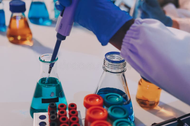 Chemists in a Lab Developing Cosmetic Products, Testing and Analyzing ...