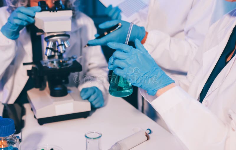 Chemists in a Lab Developing Cosmetic Products, Testing and Analyzing ...