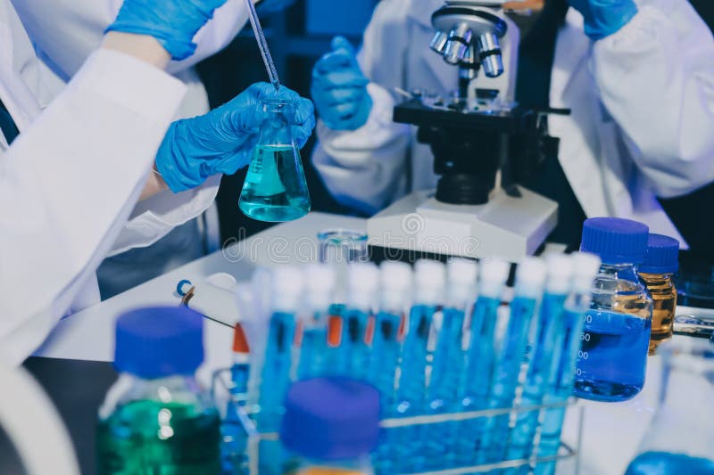 Chemists in a Lab Developing Cosmetic Products, Testing and Analyzing ...