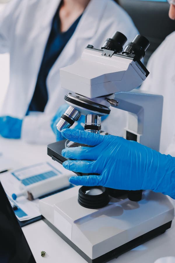 Chemists in a Lab Developing Cosmetic Products, Testing and Analyzing ...