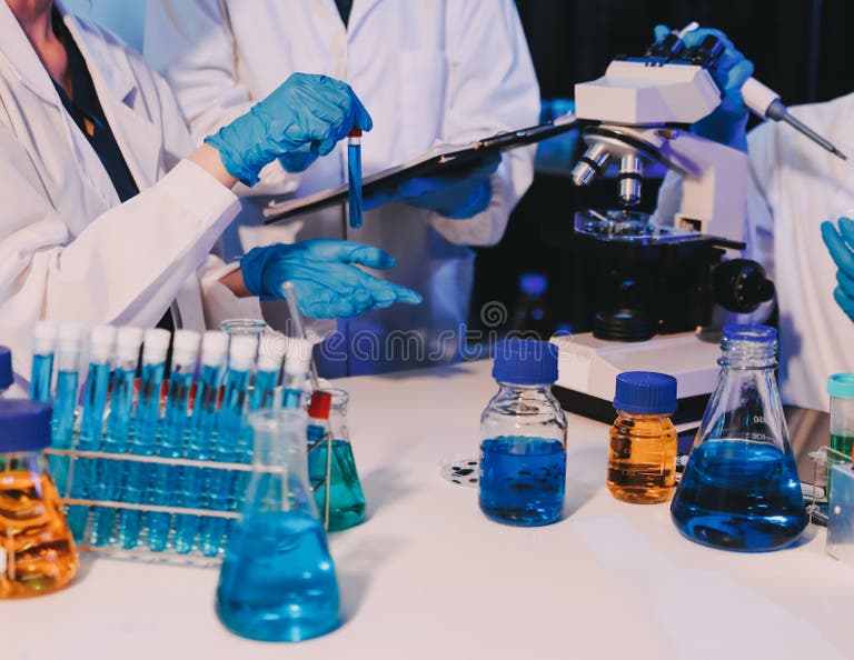 Chemists in a Lab Developing Cosmetic Products, Testing and Analyzing ...