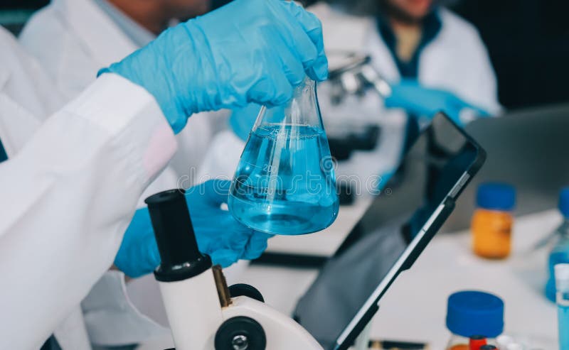 Chemists in a Lab Developing Cosmetic Products, Testing and Analyzing ...