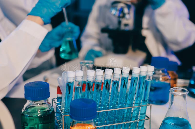 Chemists in a Lab Developing Cosmetic Products, Testing and Analyzing ...