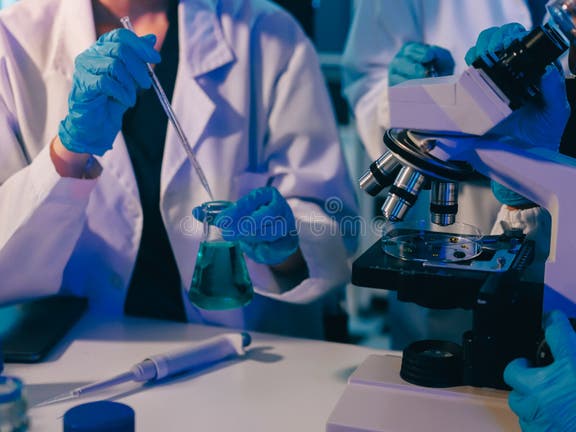 Chemists in a Lab Developing Cosmetic Products, Testing and Analyzing ...