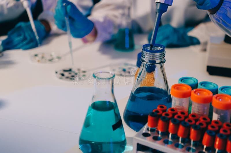 Chemists in a Lab Developing Cosmetic Products, Testing and Analyzing ...