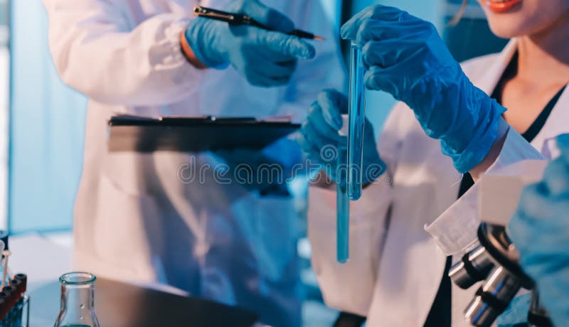 Chemists in a Lab Developing Cosmetic Products, Testing and Analyzing ...