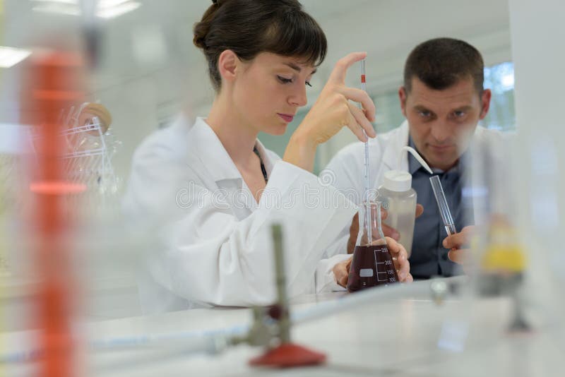 Chemists Running Blood Tests in Laboratory Stock Image - Image of clean ...