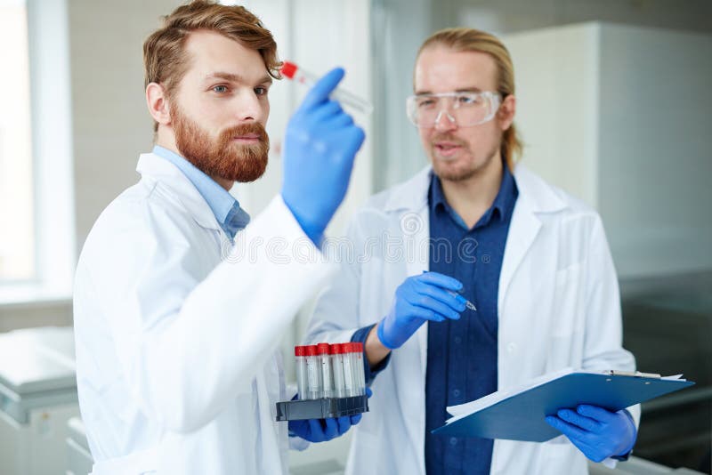 Chemists at work stock photo. Image of phial, biochemistry - 84839298