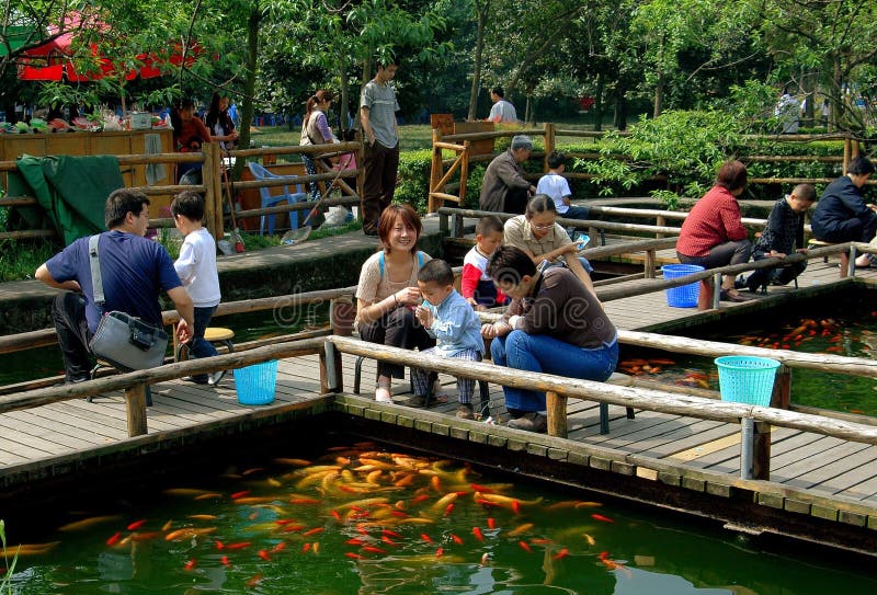Chengdu, China: Families Feeding Fish Editorial Stock Photo - Image of ...