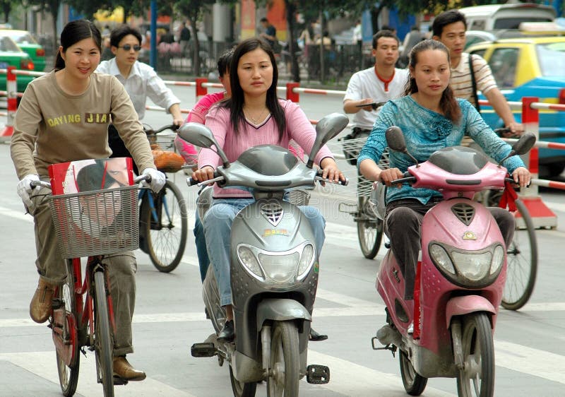 Chengdu, China: Women Riding Mopeds Editorial Stock Photo - Image of ...