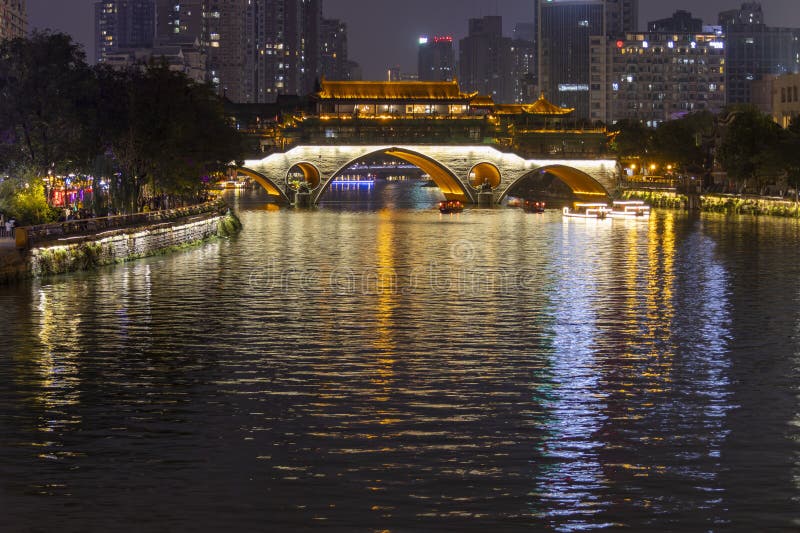Illuminated Bridge Reflected in the River in Chengdu, China. Editorial ...