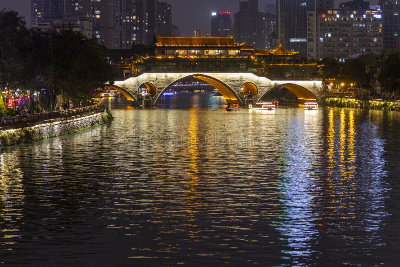 Illuminated Bridge Reflected in the River in Chengdu, China. Editorial ...