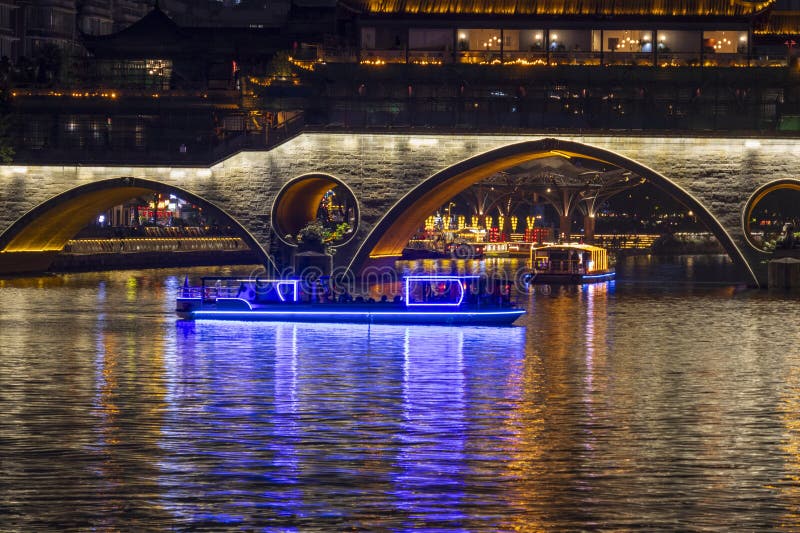 Illuminated Bridge Reflected in the River in Chengdu, China. Editorial ...