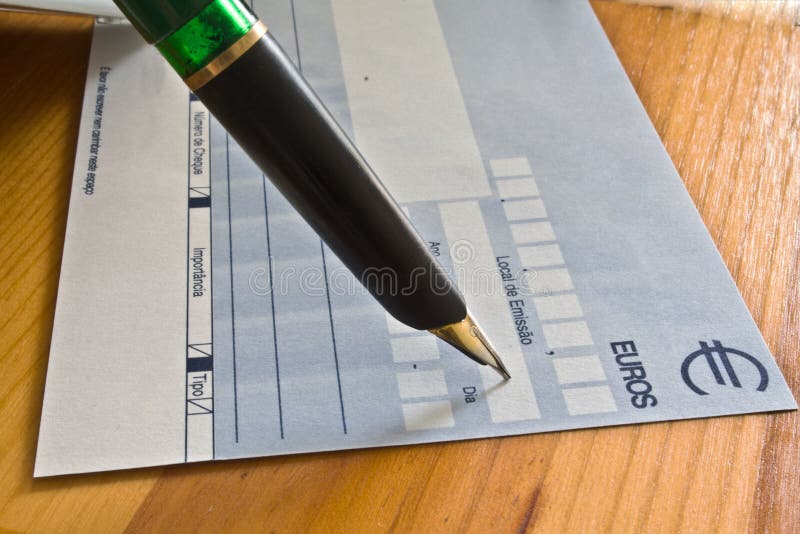 Hand signing a check stock image. Image of income, bill - 17444393