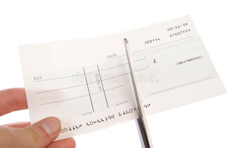 Cheque being cut up cutout stock image. Image of banking - 12219251