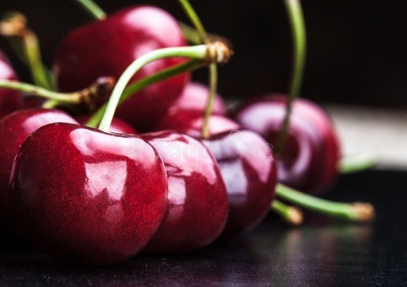 Cherries on Black Background Stock Photo - Image of couple, cherry ...