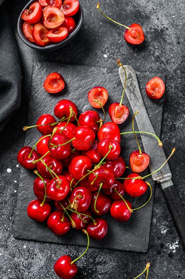 Cherries on Black Cutting Board. Fresh Ripe Cherries. Black Background ...