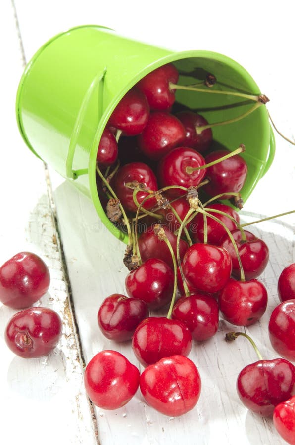 Cherries and a Green Bucket Stock Image - Image of sweet, food: 31761605