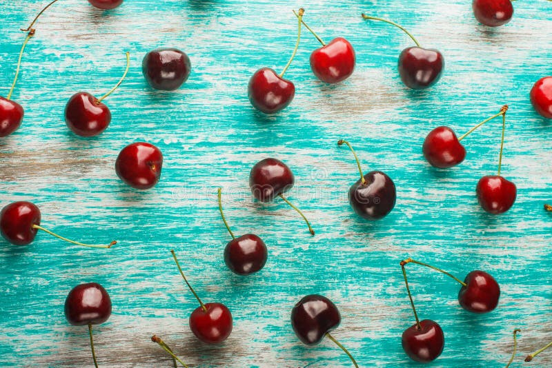 Cherries on the Light Blue Board Stock Image - Image of dessert ...