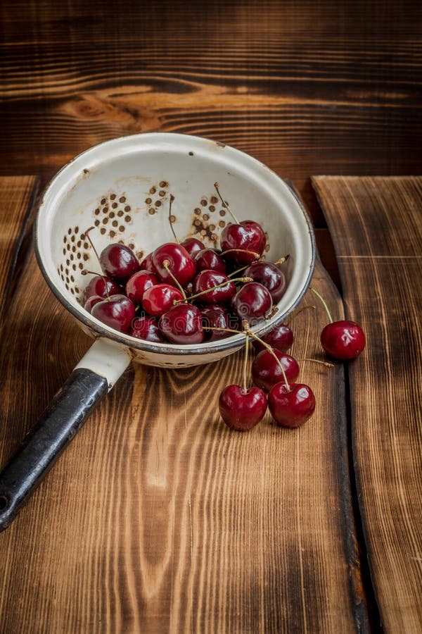 Cherry in a colander stock photo. Image of freshness - 95568174