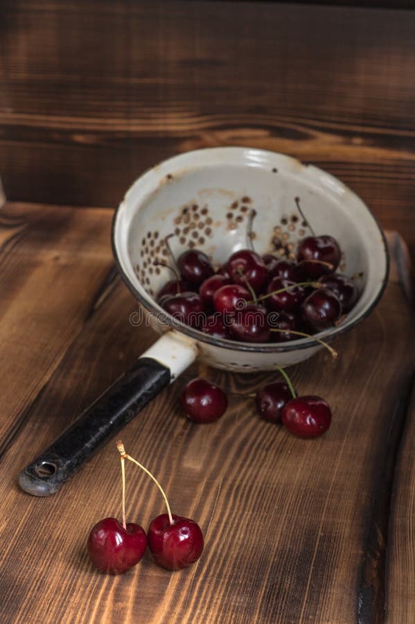 Cherry in a colander stock photo. Image of fruit, cherries - 95568506