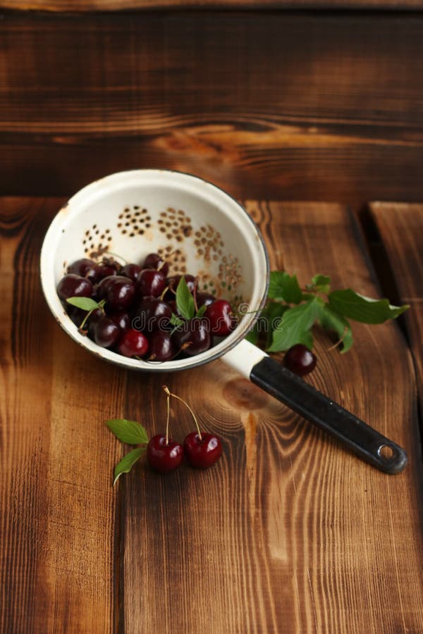 Cherry in a colander stock image. Image of group, fresh - 95568663