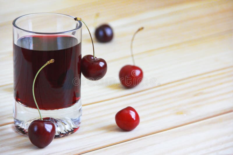 Cherry Drink in a Glass Glass and Natural Red Cherry Stock Photo ...