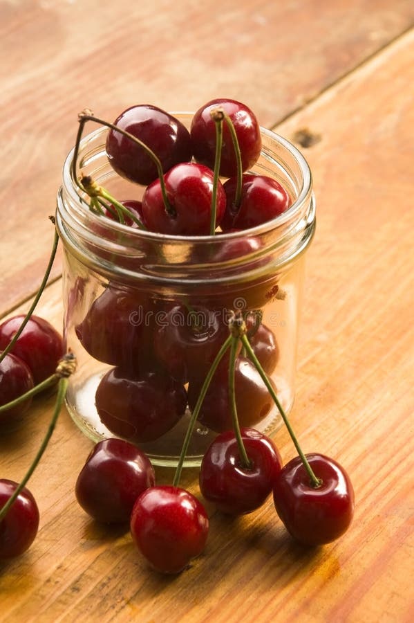 Cherry in glass jar stock image. Image of group, fruit - 25253965
