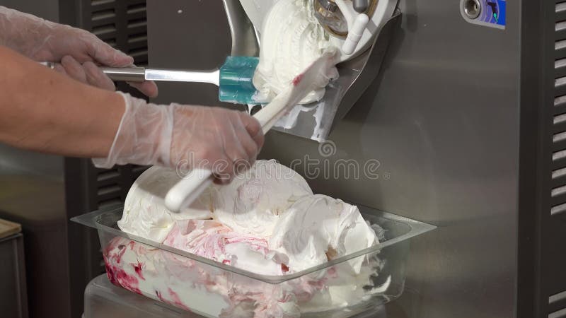 Ice Cream Production Process. Making Ice Cream in a Cup at the Factory ...