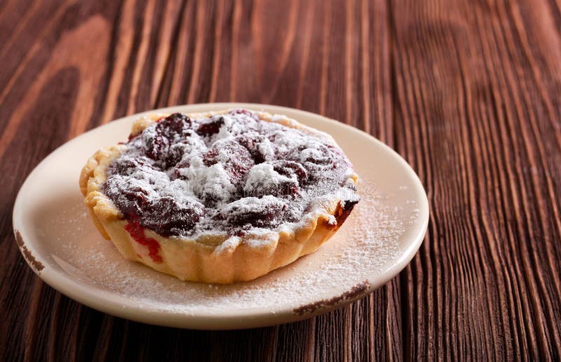 Cherry Mini Tart with Icing Sugar Stock Image - Image of cherry, powder ...