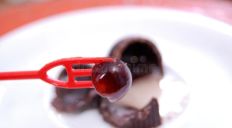 Cherry in a praline stock image. Image of covered, candy - 46096815